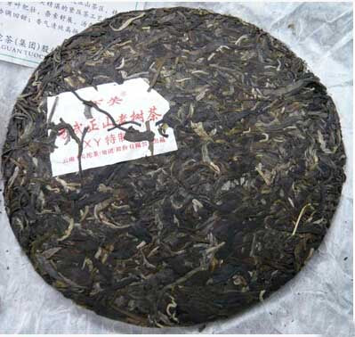 2010 XiaGuan "Yi Wu Zheng Shan" (Yiwu Right Mountain Green Sun) Cake 3